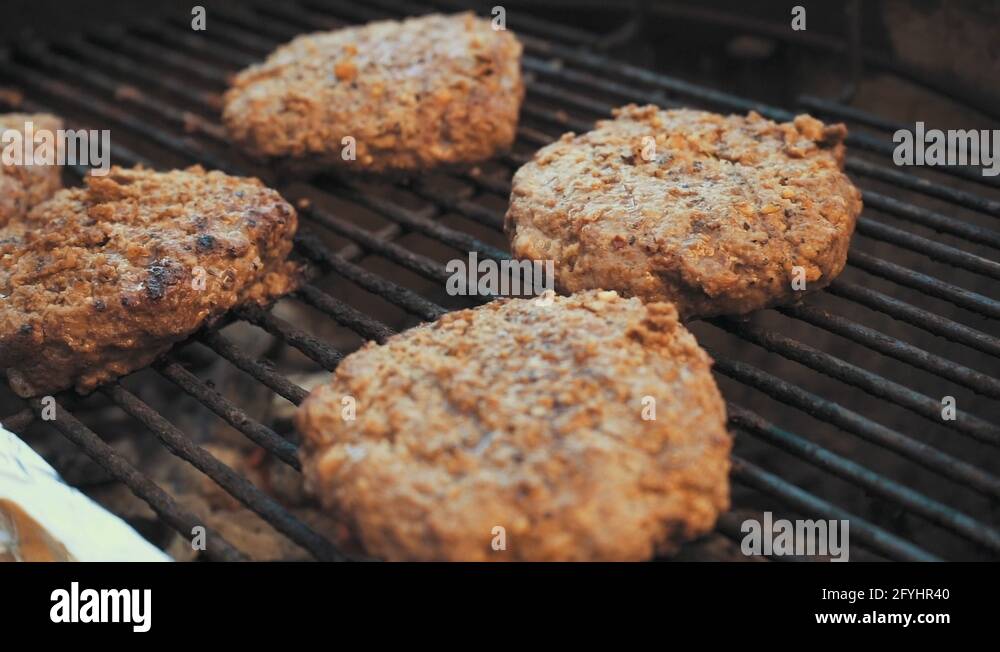 Hamburger patties cooking on grill Stock Videos & Footage - HD and 4K ...