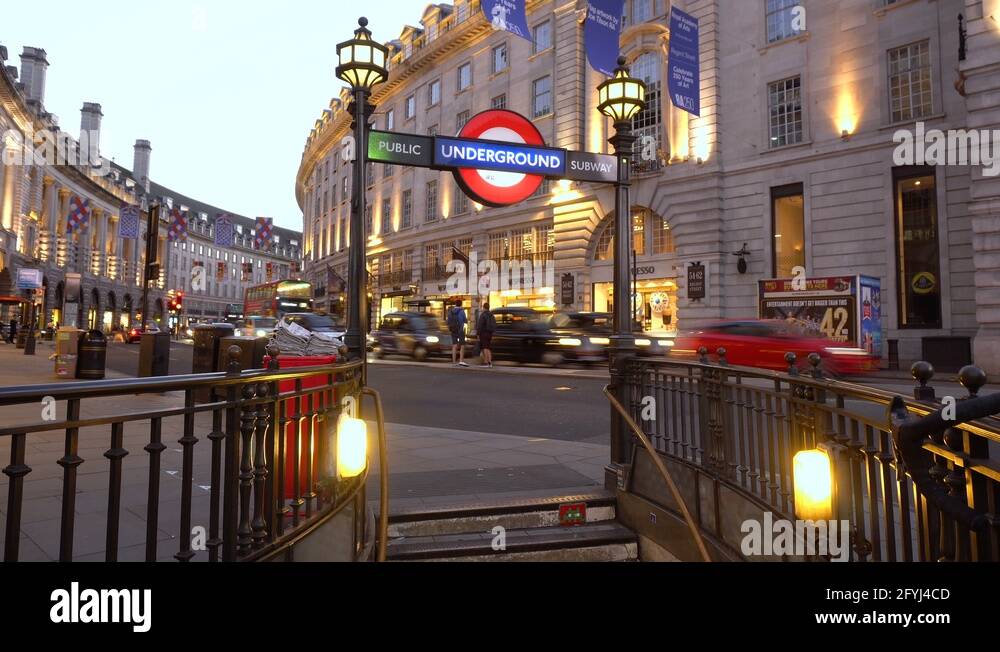 Oxford Street in London, Tube Station Entrance Stairs and Traffic Time ...