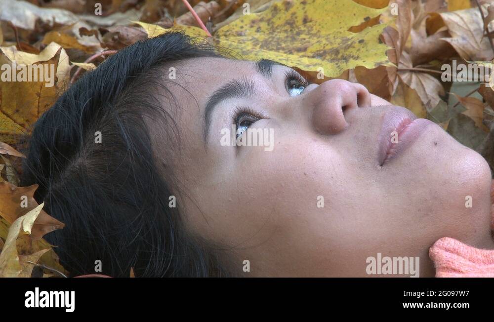 Woman laying in pile of Stock Videos & Footage - HD and 4K Video Clips ...