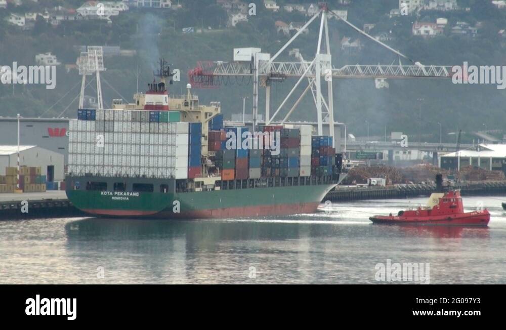 Tug guiding container ship Stock Videos & Footage - HD and 4K Video ...