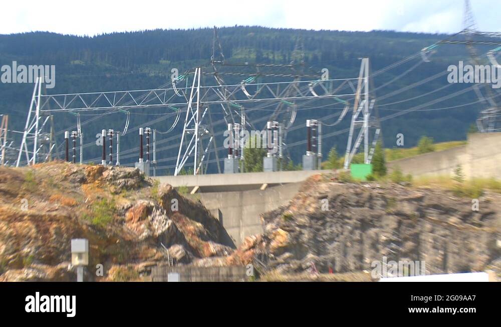 river and waterfall,Dam superstructure from electric substation, pan ...