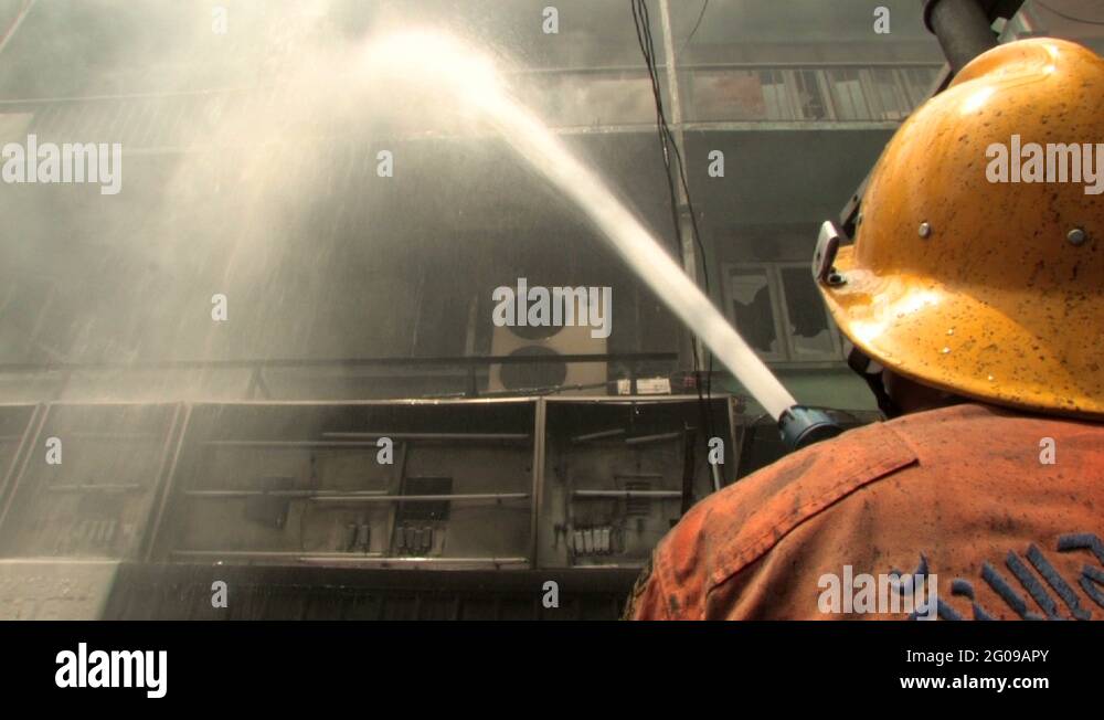Firemen using hose Stock Videos & Footage - HD and 4K Video Clips - Alamy