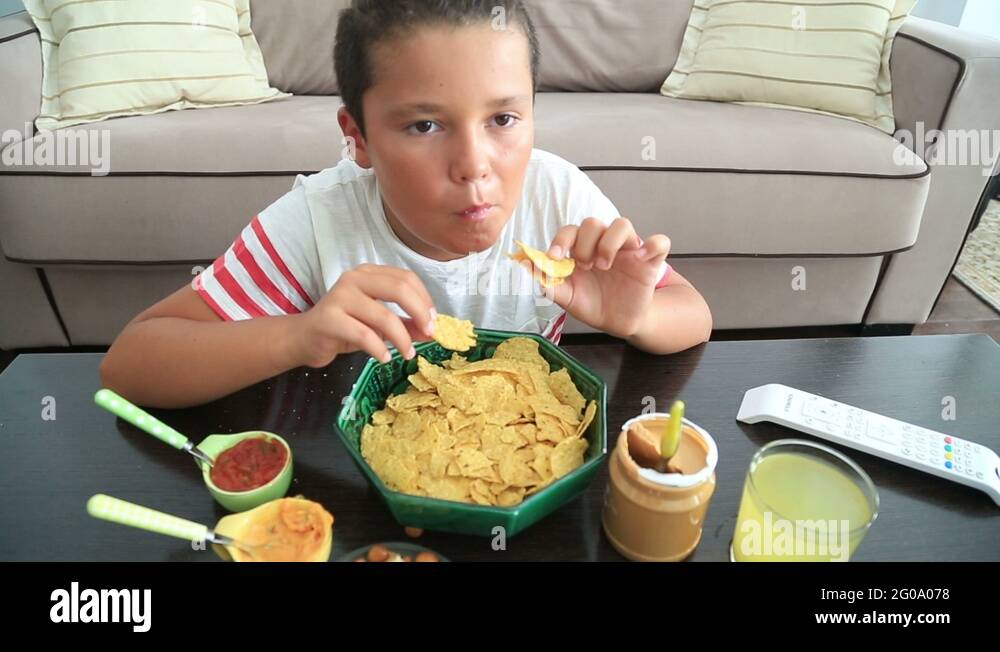 Eating nachos people Stock Videos & Footage - HD and 4K Video Clips - Alamy