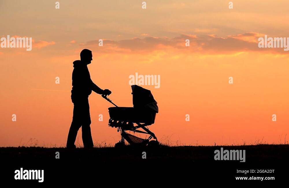 Father pushing pram Stock Videos & Footage - HD and 4K Video Clips - Alamy