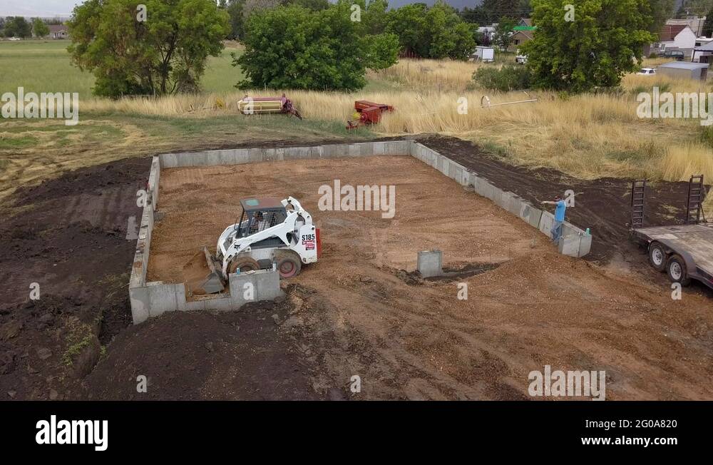 Building new rural farm building concrete preparation 4K Stock Video ...