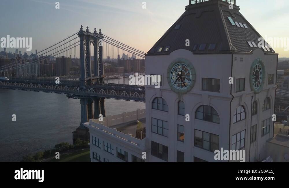 closer rising over iconic clocktower in Dumbo Brooklyn Stock Video ...