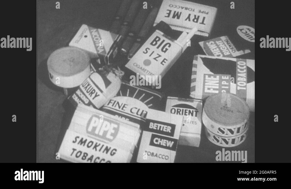 1950s: UNITED STATES: cigarette packets on turntable. Cigarette brands ...