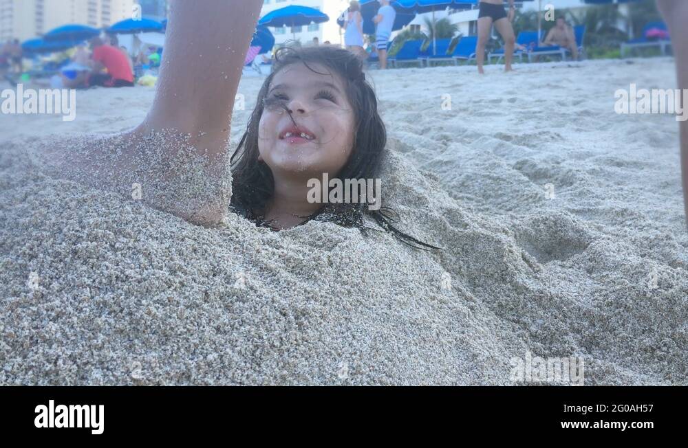 Girl Buried In Sand Stock Videos And Footage Hd And 4k Video Clips Alamy