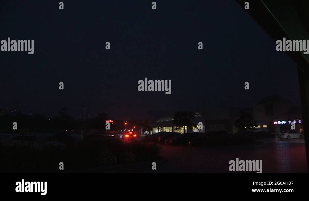 Summer thunderstorm with flashes of lightning as cold front approaches ...
