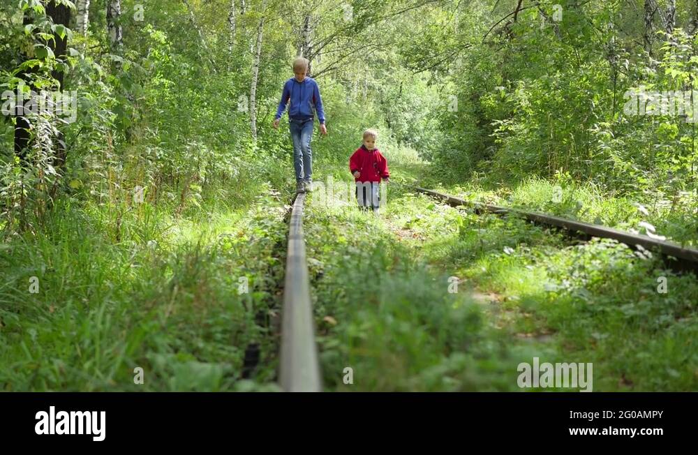 Young boy walking train tracks Stock Videos & Footage - HD and 4K Video ...
