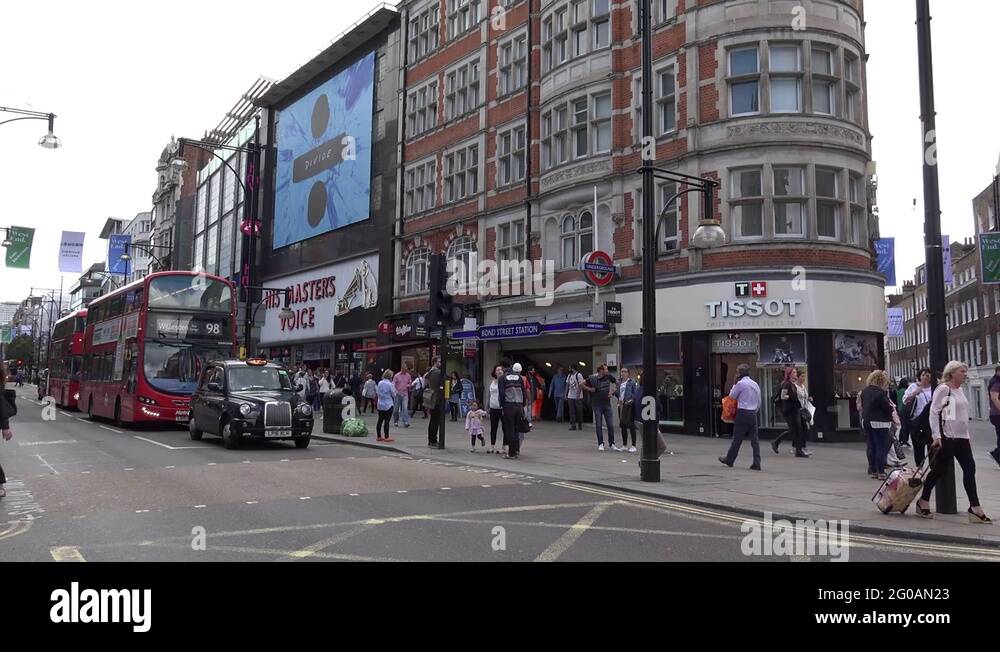 Iconic retro taxi cabs and double decker red buses in London Stock ...