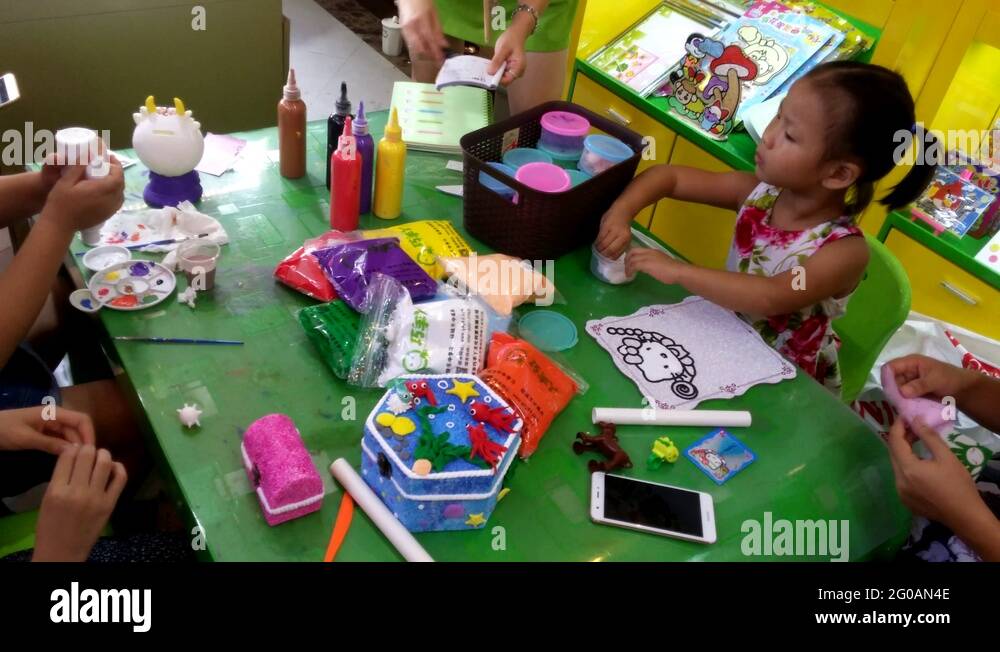 Chinese children play at children's playground Stock Video Footage - Alamy