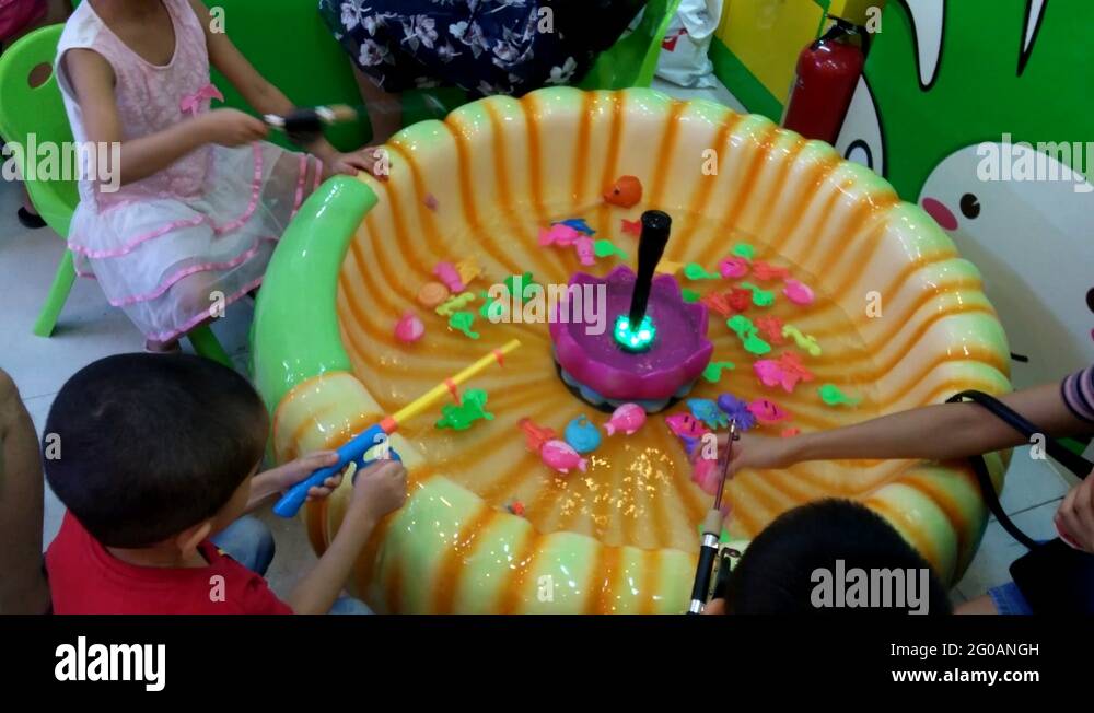 Chinese children play at children's playground Stock Video Footage - Alamy