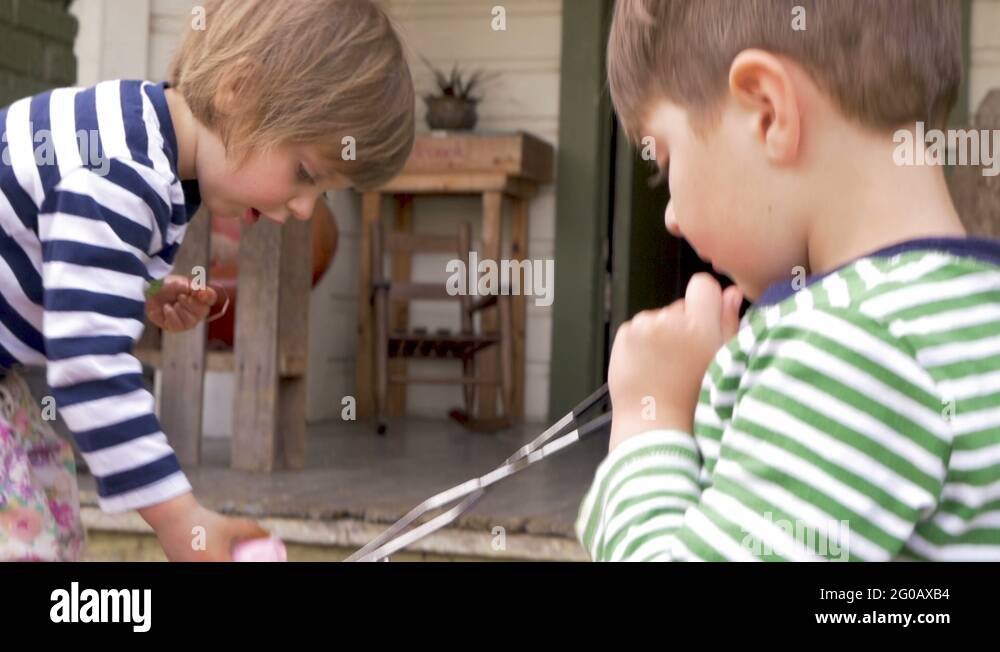 Older sister helping brother Stock Videos & Footage - HD and 4K Video ...