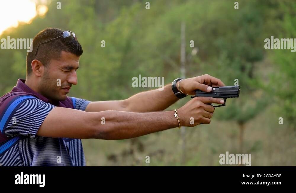 Arab man gun Stock Videos & Footage - HD and 4K Video Clips - Alamy