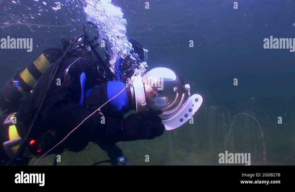 Cat scuba diver on background of reflection sunlight underwater Stock ...