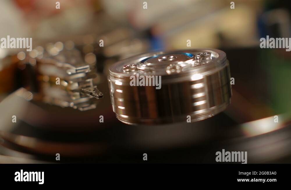 Spin up and operating hard disk drive on warm background Stock Video ...