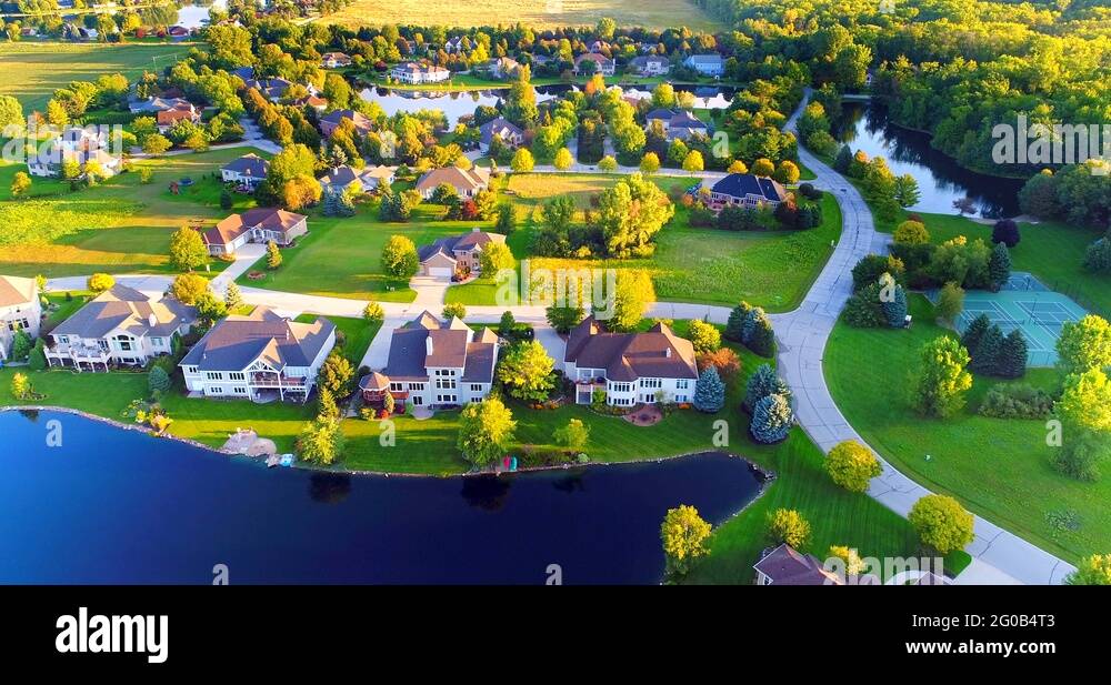 Beautiful neighborhoods, homes around lake, aerial view, dawn Stock ...