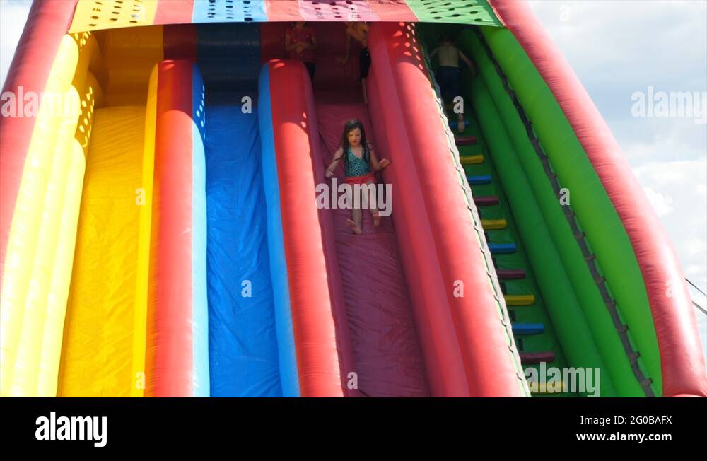 Girl slide slides splash Stock Videos & Footage - HD and 4K Video Clips ...