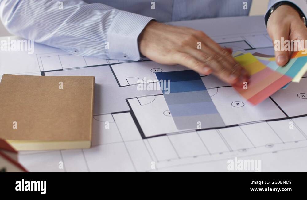 architect hands with blueprint and color palettes Stock Video Footage ...