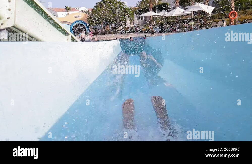 POV of a man riding water slide in water park Stock Video Footage - Alamy