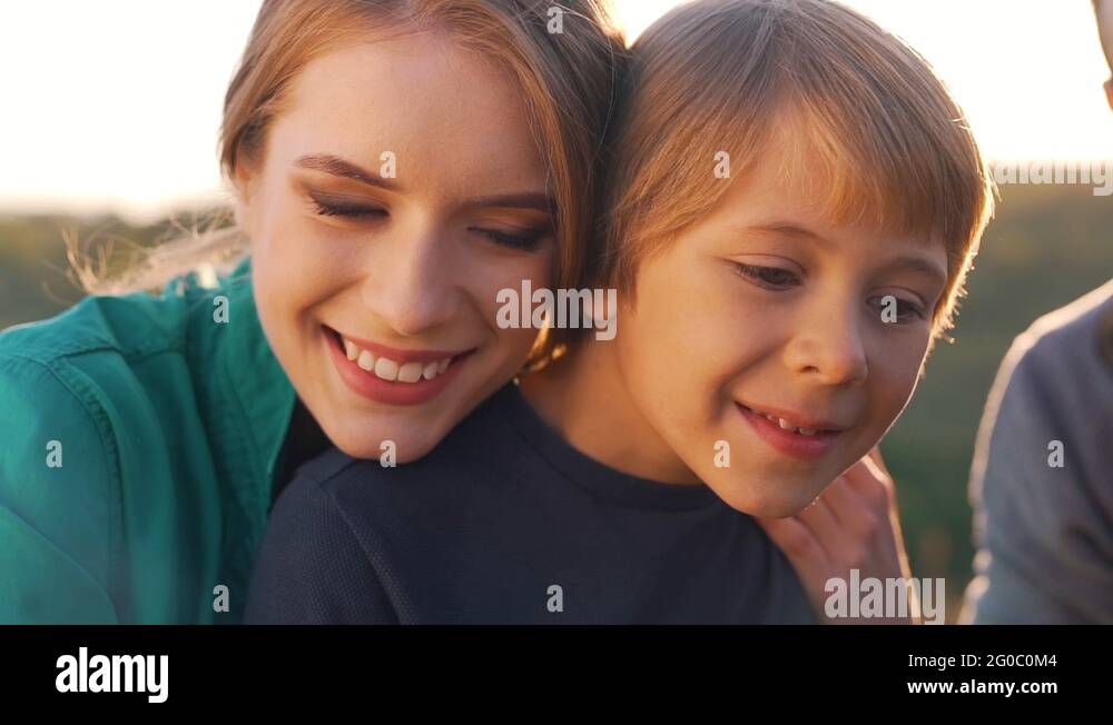 Mother hugs son fire Stock Videos & Footage - HD and 4K Video Clips - Alamy