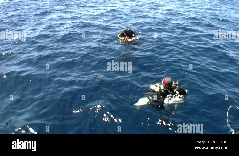 Scuba divers submerged under water in Red sea Stock Video Footage - Alamy