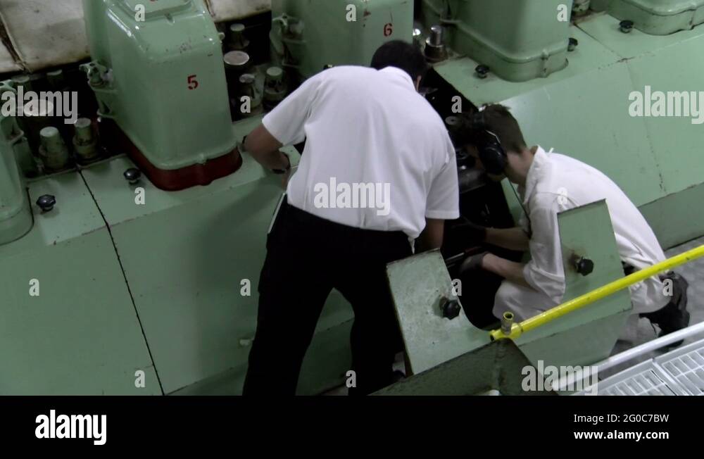 Ship mechanic working on massive cruise ship engine Stock Video Footage ...