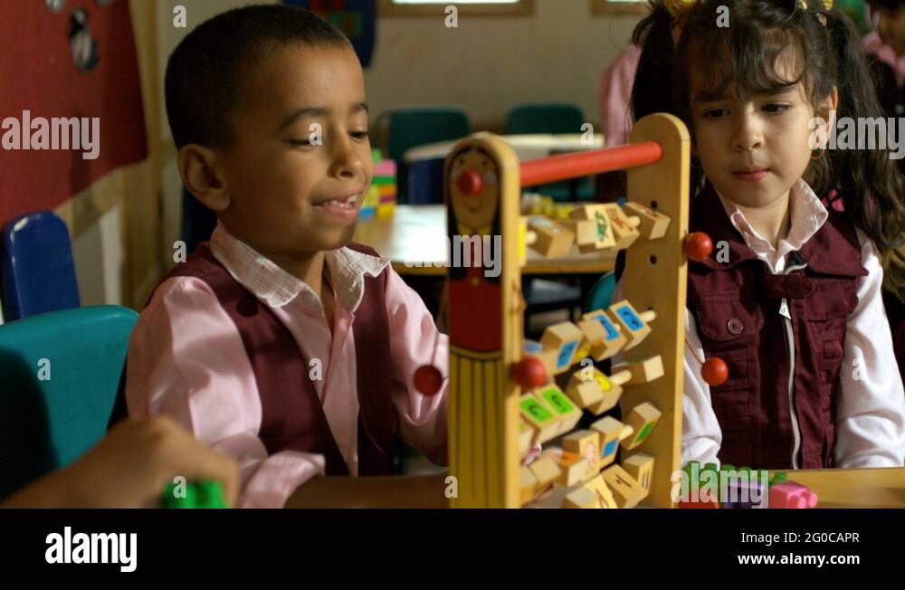 School kids learning alphabet abacus in the classroom Stock Video ...