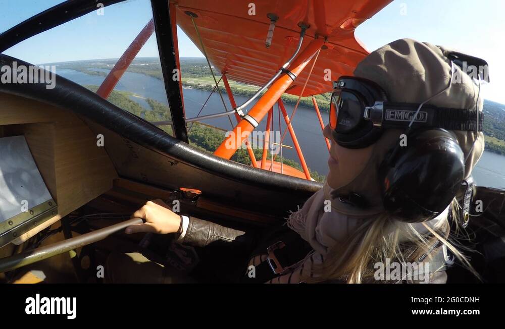 biplane cute girl in vintage getup flying 4k Stock Video Footage - Alamy