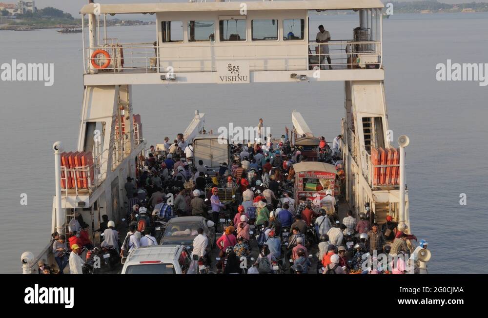 Crowded Ferry on Mekong with motorcycles,Phnom Penh,Cambodia Stock ...