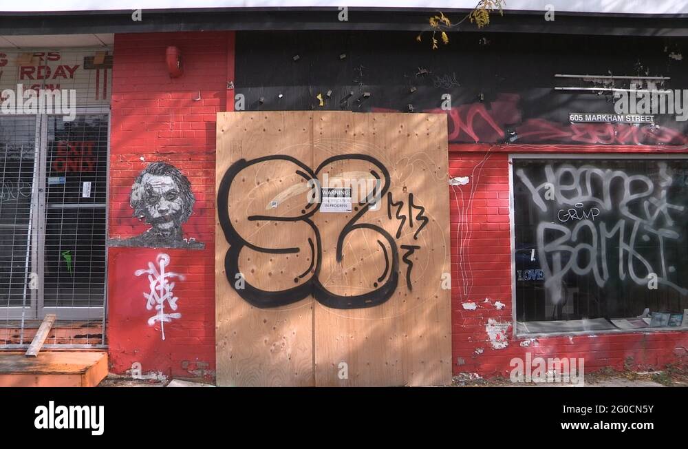 Anti gentrification protest signs in downtown urban Toronto Stock Video ...