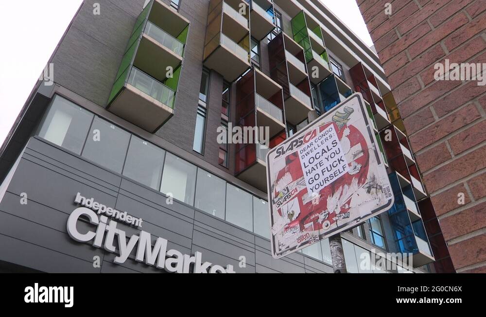 Anti gentrification protest signs in downtown urban Toronto Stock Video ...