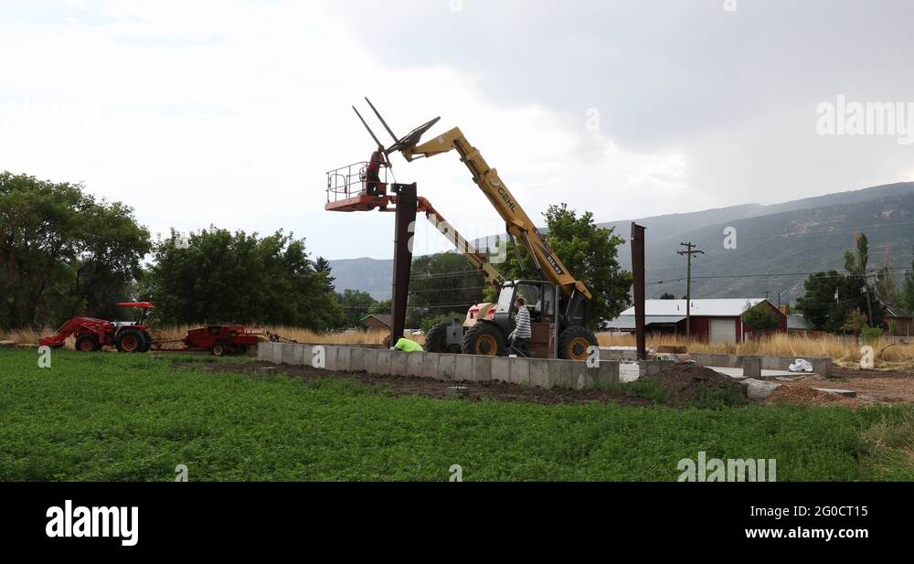 Construction rural farm building install steel beam 4K Stock Video ...