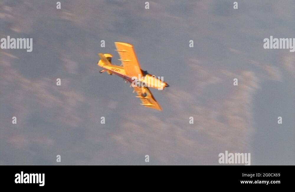 Fire fighting plane fly low and spray fire extinguisher Stock Video ...
