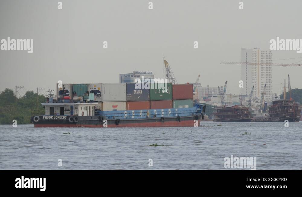 River boat transporting containers,Saigon,Vietnam Stock Video Footage ...