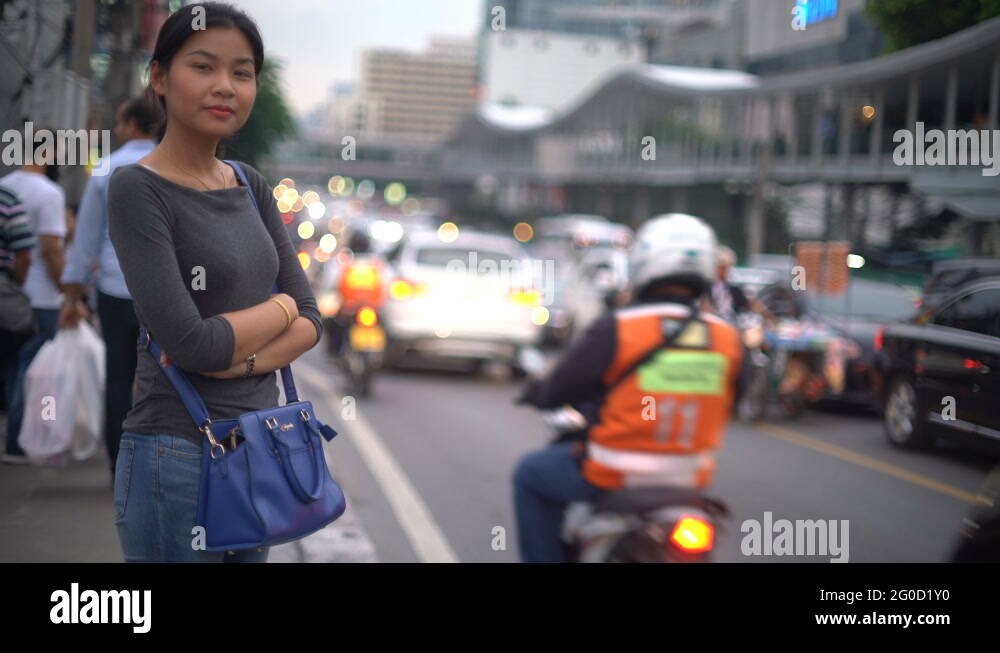 Young Asian Woman pedestrian waiting for green traffic light 4k UHD ...