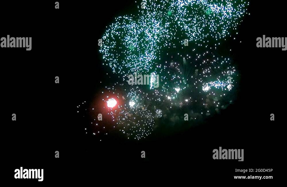 Firework display at night on black background Stock Video Footage - Alamy
