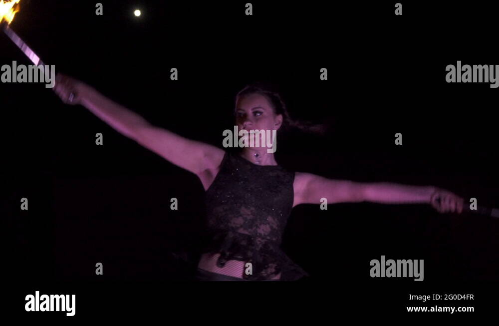 Fiery dance. Amazing magical Fire Show at night. Slow shutter speed. Fire sho Stock Video ...