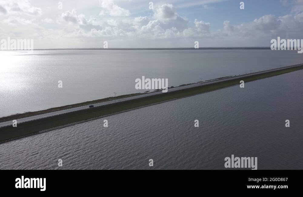 Accessroad to the island Rømø in the Danish Wadden sea national park ...