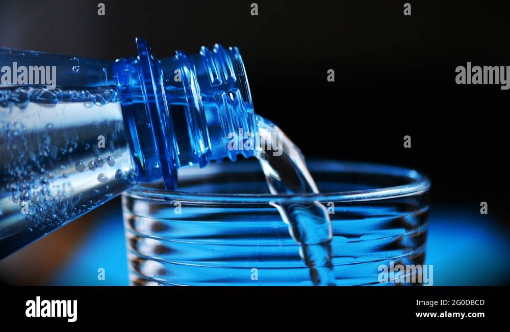 Bottled water pouring into glass Stock Videos & Footage - HD and 4K Video Clips - Alamy