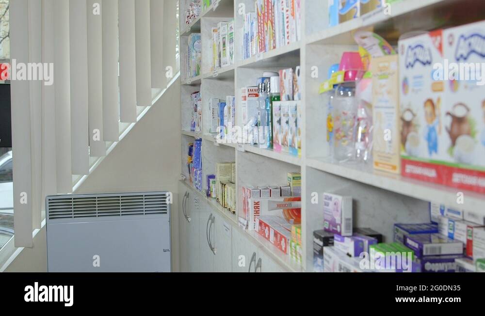 Pharmacy counter display showcase with medicines at the drugstore Stock ...