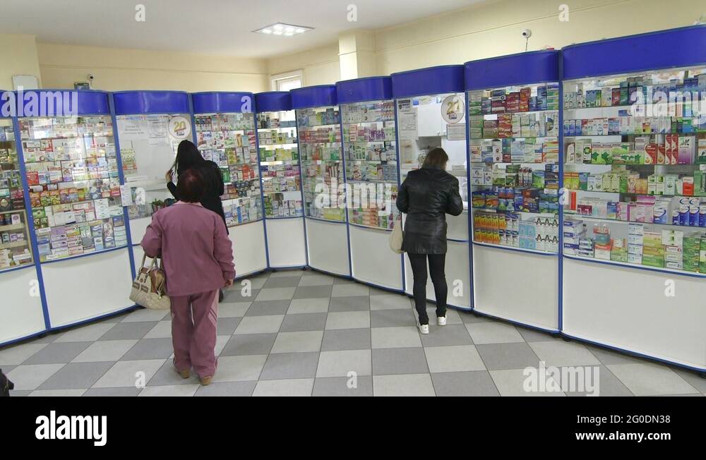 Pharmacy counter display showcase with medicines for sale at the ...