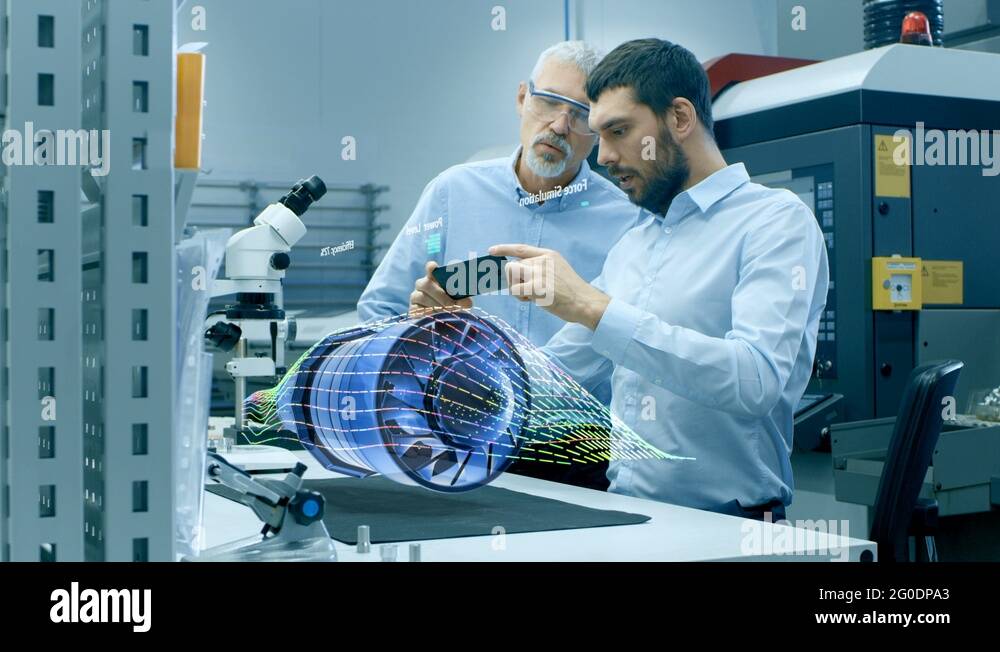 Two Engineers Works with Mobile Phone Using Augmented Reality ...
