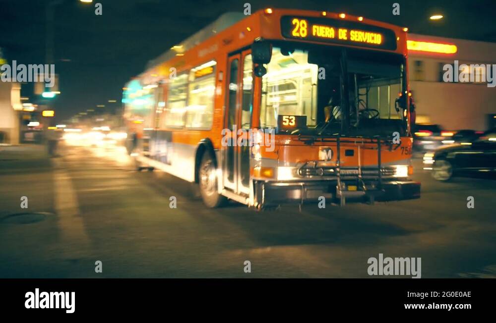 Metro bus crossing street intersection on Melrose in Los Angeles at ...