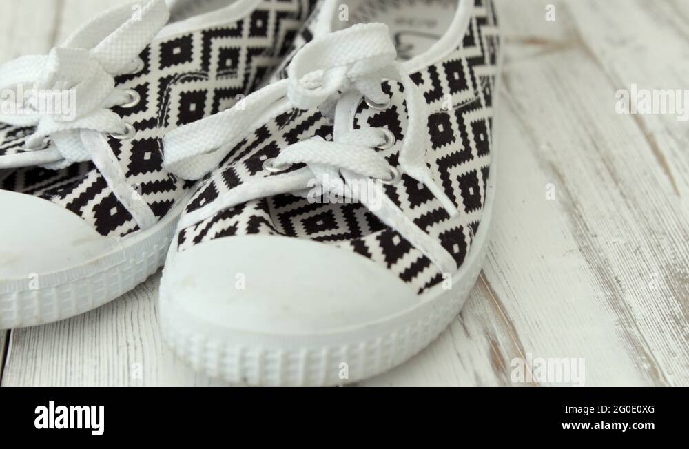 White plimsolls Stock Videos & Footage - HD and 4K Video Clips - Alamy