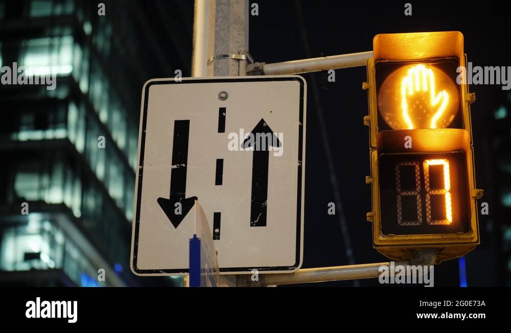 Traffic light for pedestrians with a countdown. Evening Toronto, Canada ...
