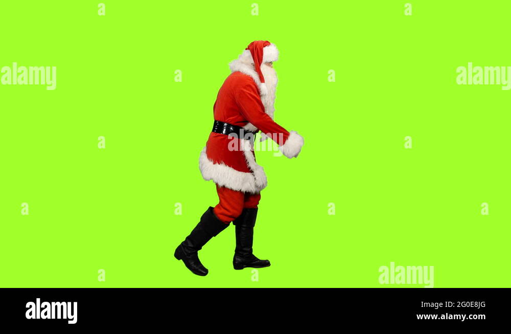 Side view of walking Santa on green screen background, Chroma key Stock ...