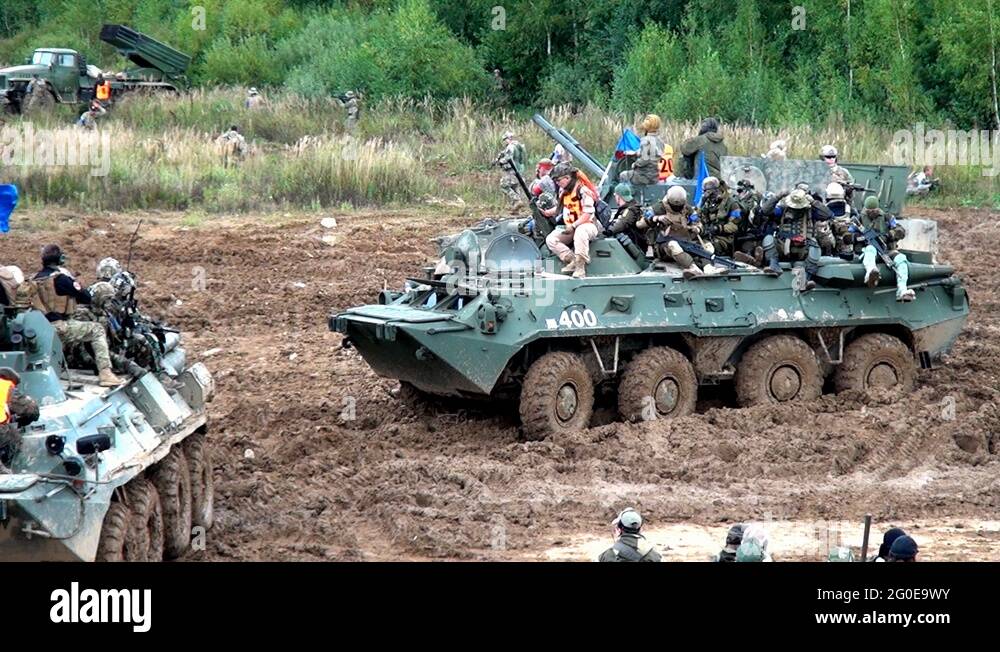 Squad of strikeball team with machine submachine guns on panze Stock ...