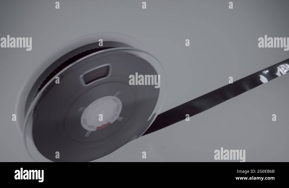 Coil VHS with magnetic tape rolling on white surface Stock Video ...